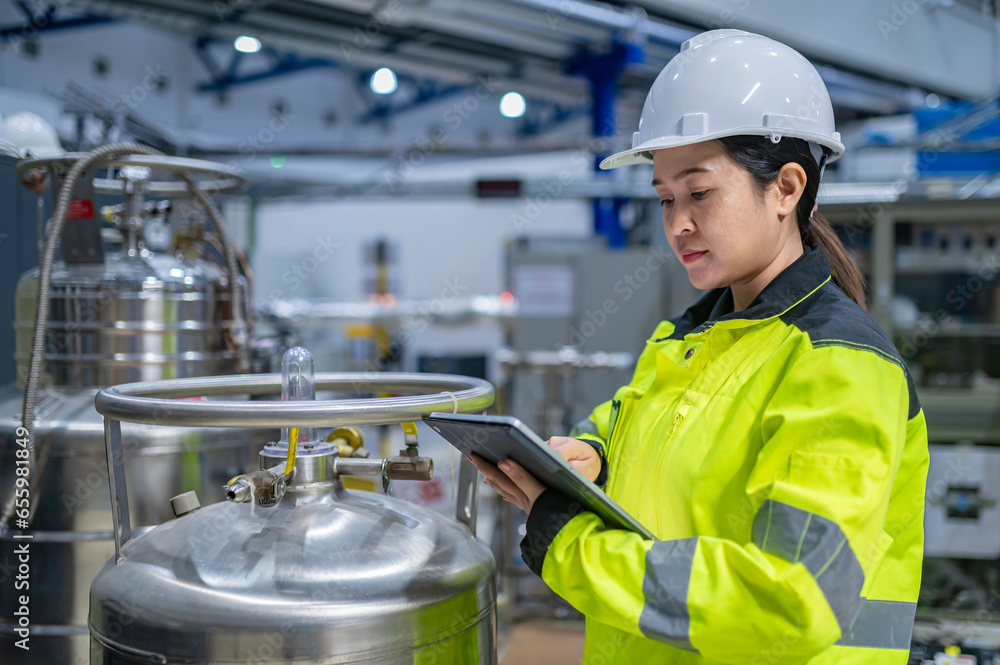 Asian engineer working at Operating hall,Thailand people wear helmet ...