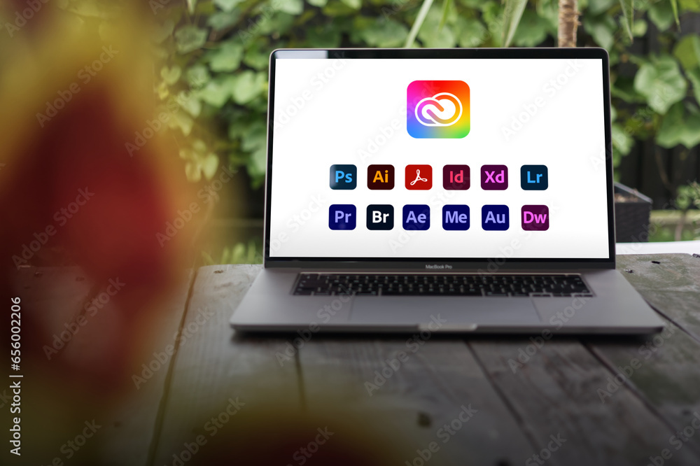 Adobe Creative Cloud and all it's contents logotypes, displayed on a MacBook Pro screen Stock ...