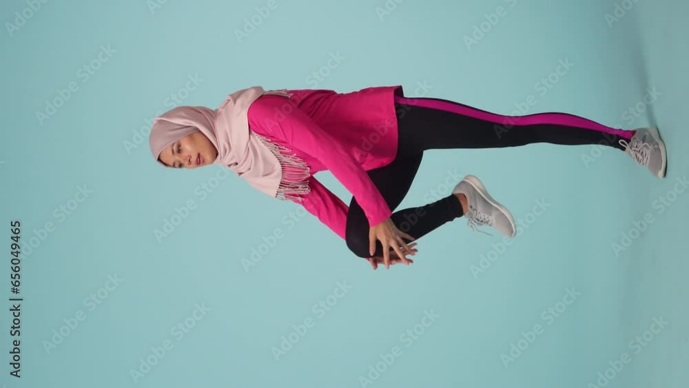 Full-sized isolated video capturing an attractive young woman wearing a ...