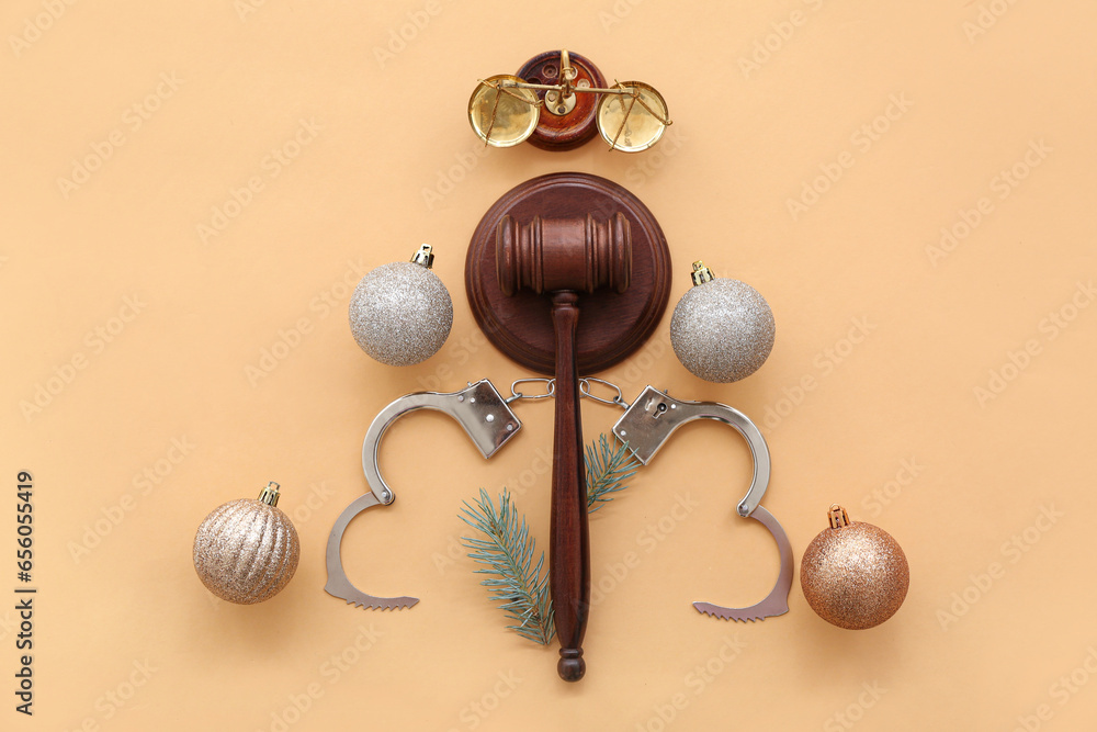 Christmas tree made of judge's gavel, justice scales, handcuffs and ...