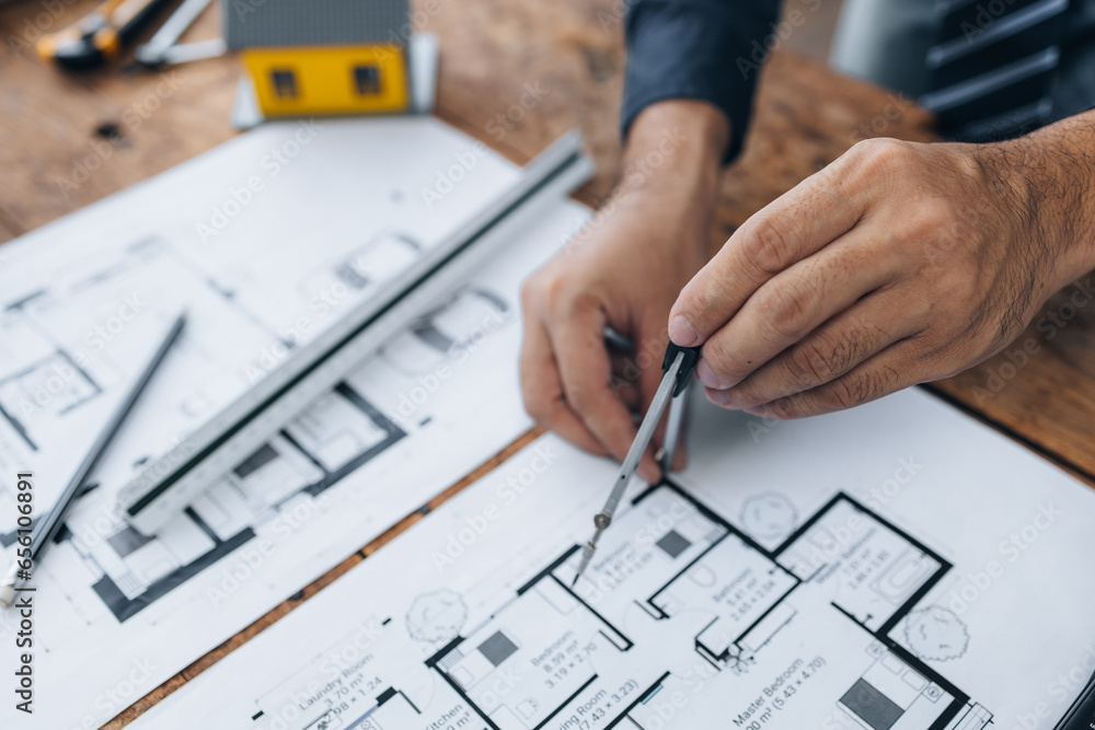 Architects sketch and edit real estate building plans, design buildings ...