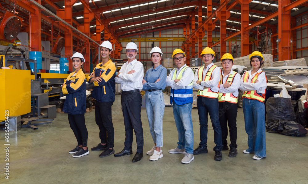 Industrial teamwork. Group of male and female factory labor stand ...