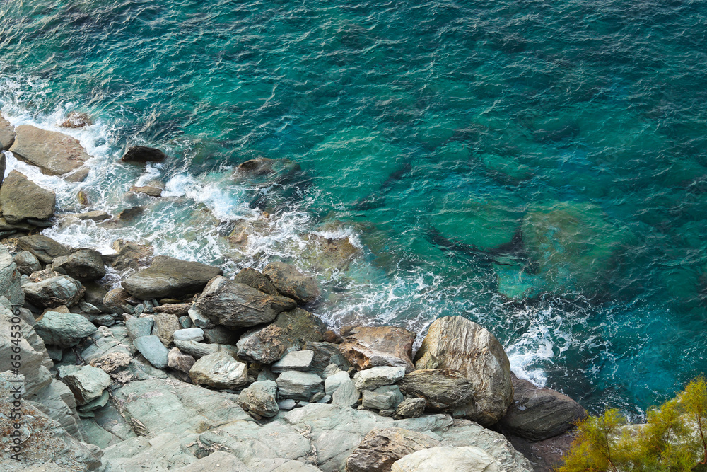 A top down aerial view of rocks and sea. A stunning visual perspective ...