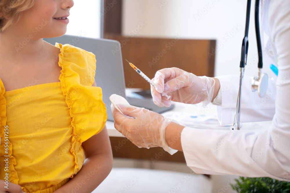 Child vaccination in pediatrician hospital medical clinic office ...