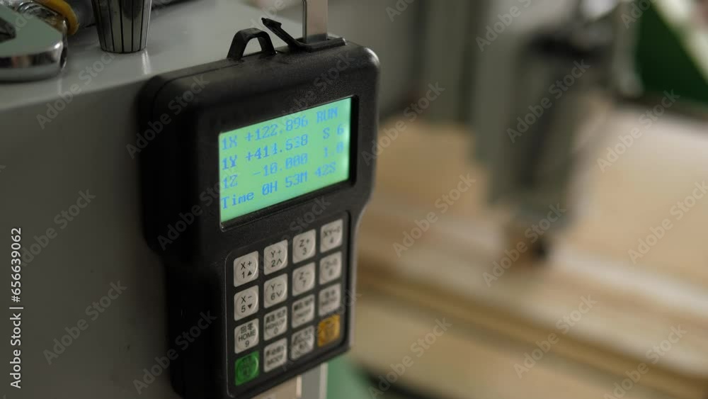 The control panel of the woodworking machine with CNC. The screen of a ...