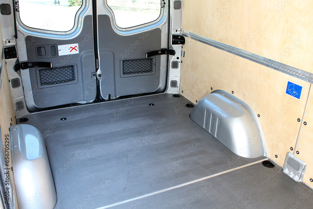Van cargo compartment. Empty freight compartment of a van. Clean empty ...