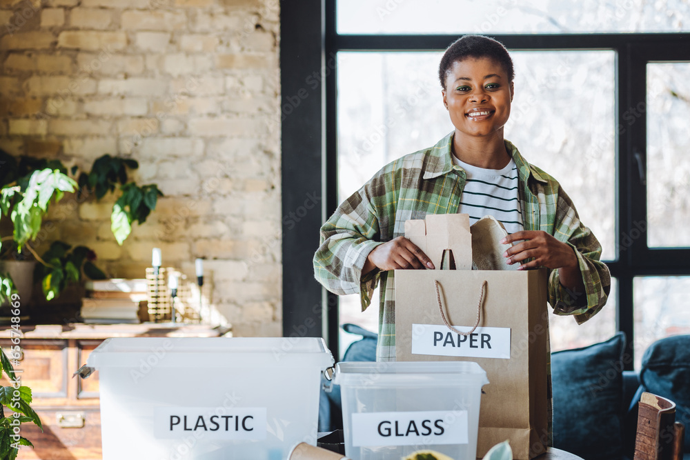 Photo & Art Print Young university student is managing waste sorting at ...