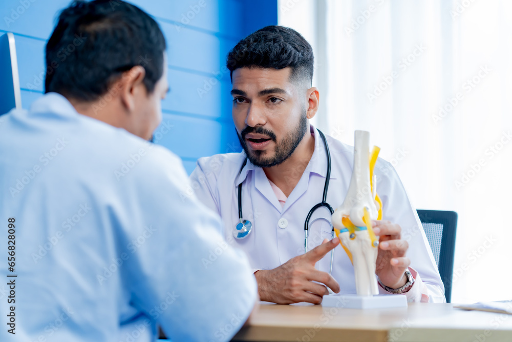 Asian male orthopedics professional doctor consulting explaining knee ...
