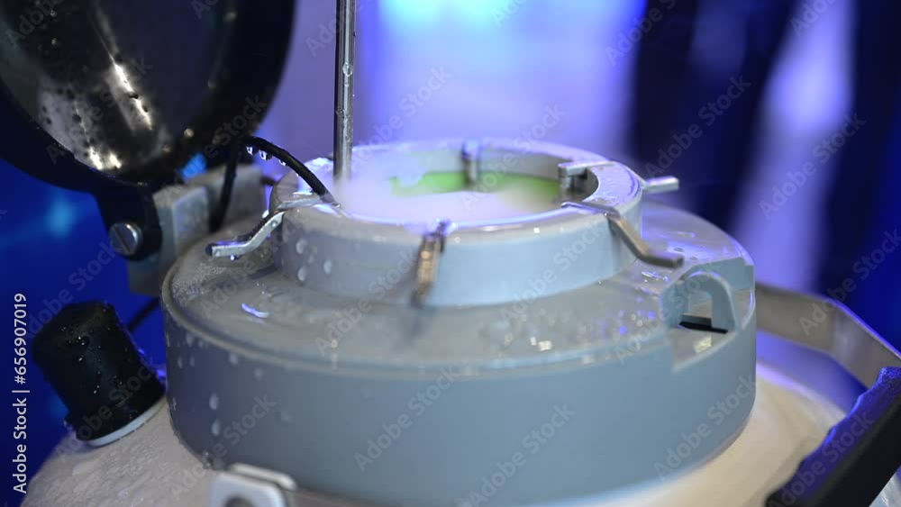 Steam and gases of liquid nitrogen come from an open pressure vessel ...