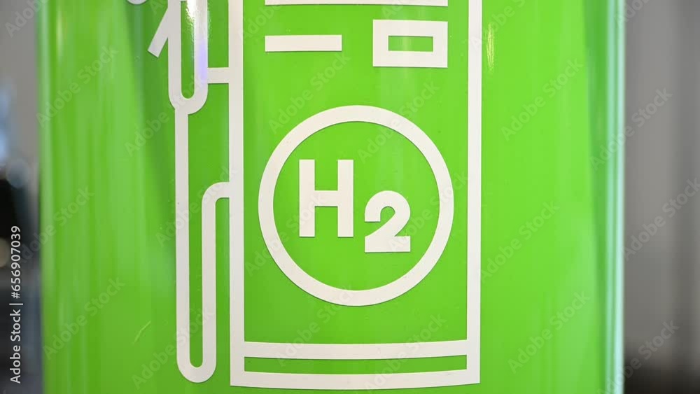 The pictogram of a hydrogen filling station, fuel pump on green ...