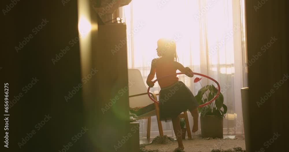 Little girl dancing playfully pretending to be a ballerina, happy child ...