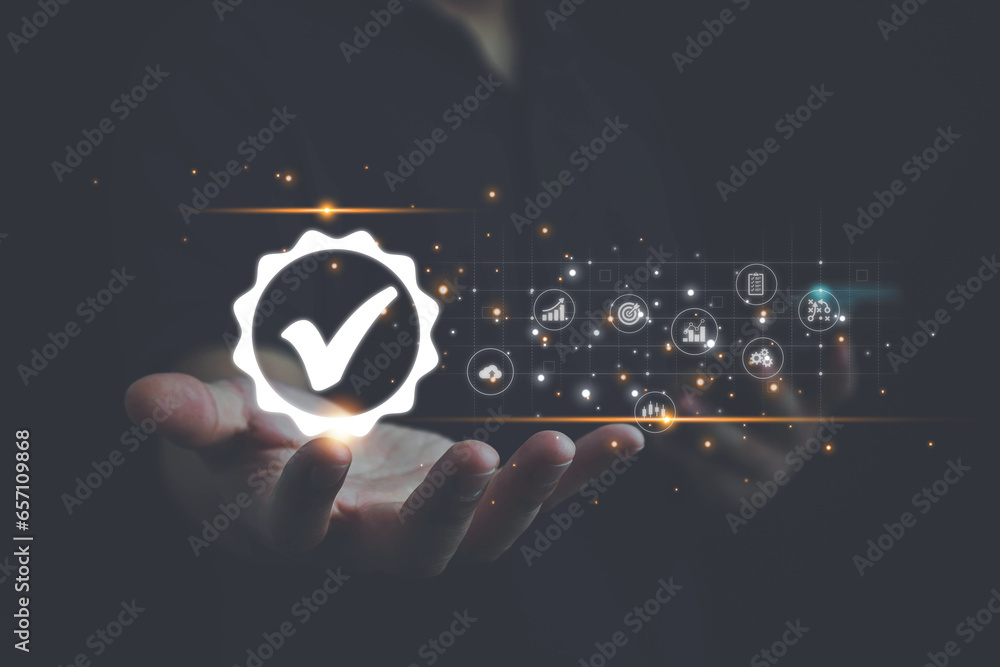 Hand shows sign of top service Quality assurance, ISO certification and ...