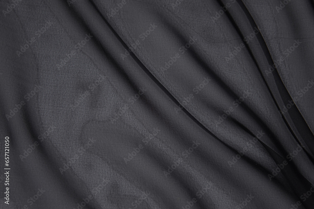 Black fabric texture background, wavy fabric slippery black color ...