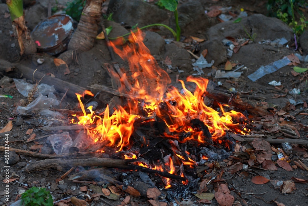 Fire burning pile of garbage. Concept, Incineration of household waste ...