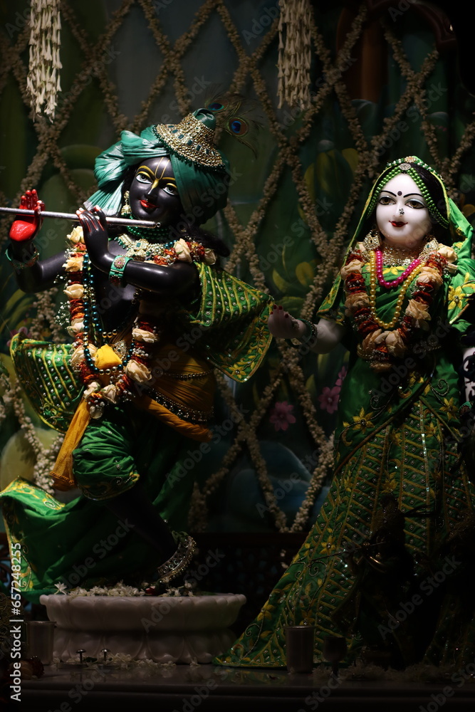 Goddess Radha and Lord krishna decorated with colourful flowers Stock ...