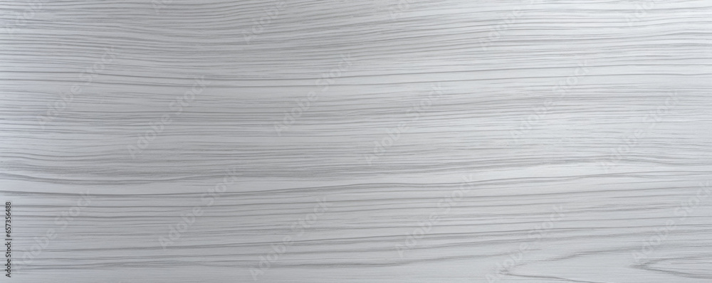 Texture of a glossy silver metal with a faint woodgrain pattern. The ...