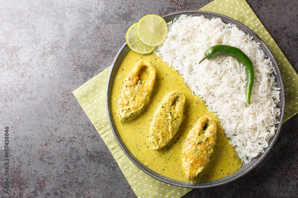 Bengali Shorshe Ilish or Hilsa cooked in Mustard Gravy served with ...