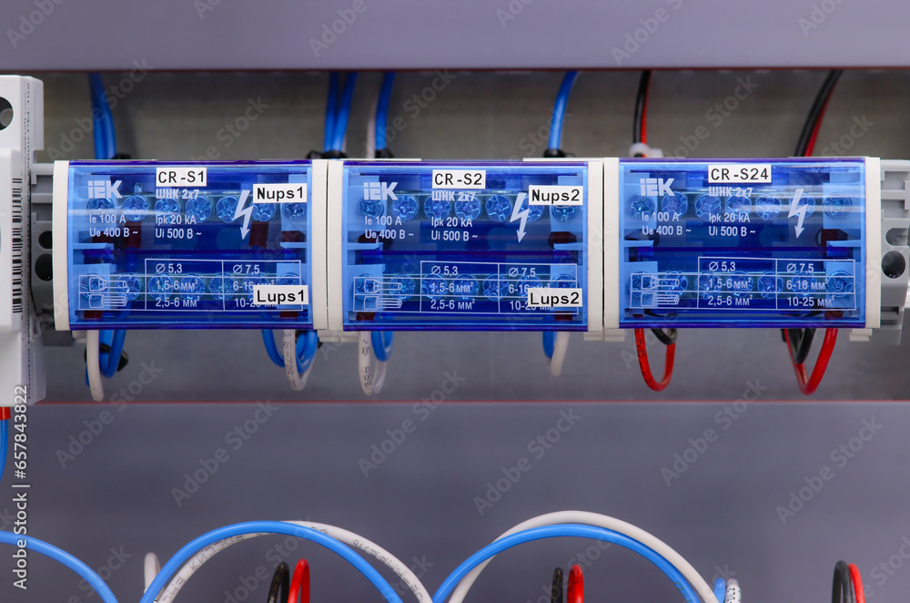 IEK electrical distribution units for connecting electrical copper wiring. Stock Photo | Adobe Stock