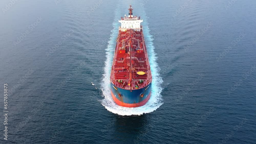 Flying over a crude oil tanker underway in open sea. Bow, forecastle ...
