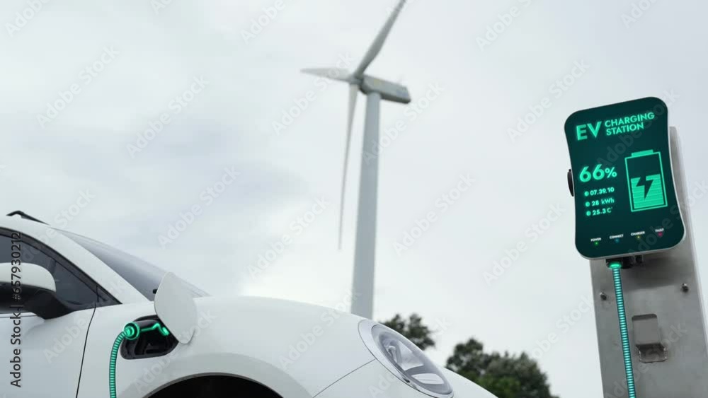 Electric car recharging energy from charging station by smart EV ...