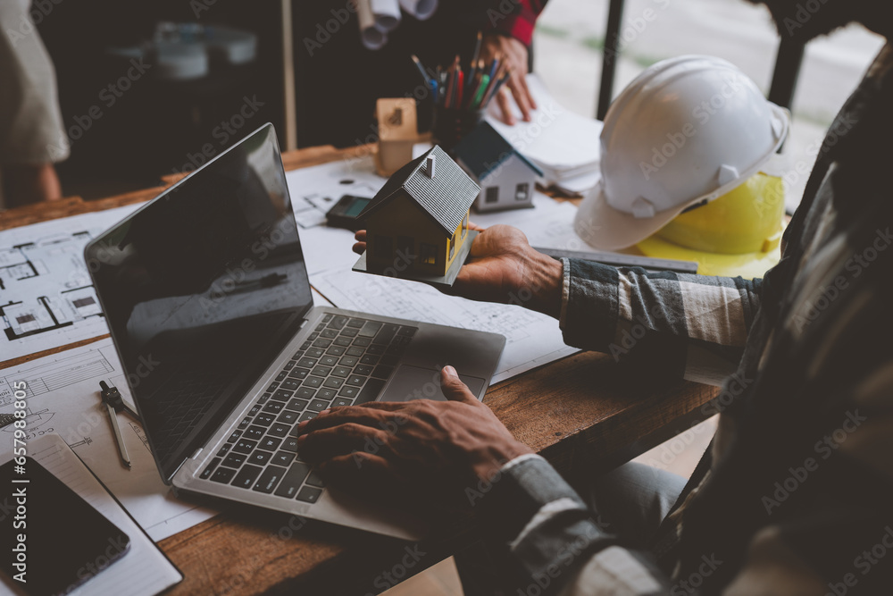 Architects and engineers work together in business, submitting ...