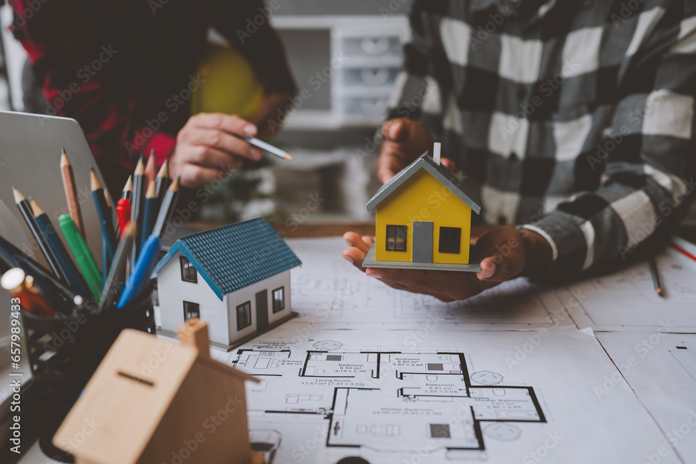 Architects and engineers work together in business, submitting ...