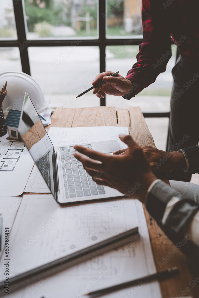 Architects and engineers work together in business, submitting ...