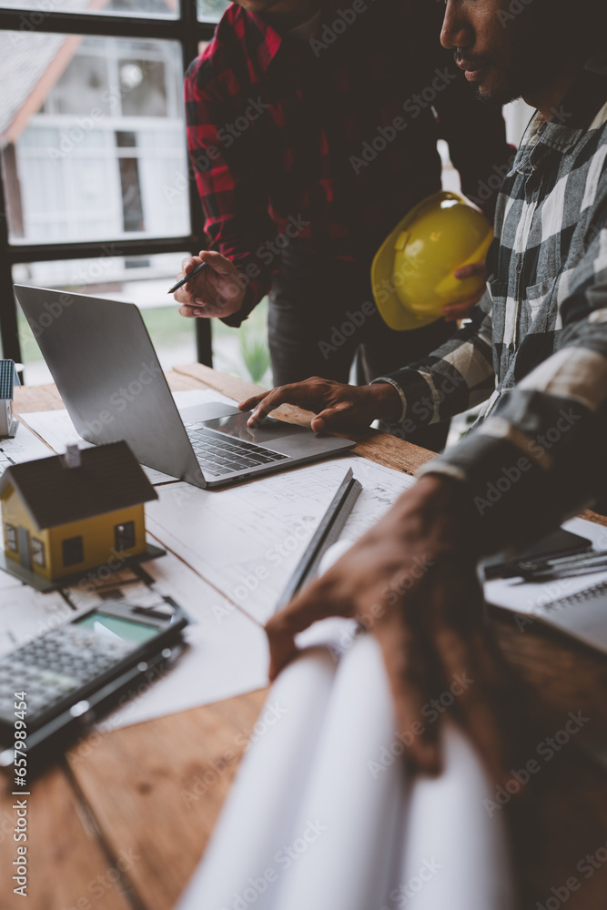 Architects and engineers work together in business, submitting ...