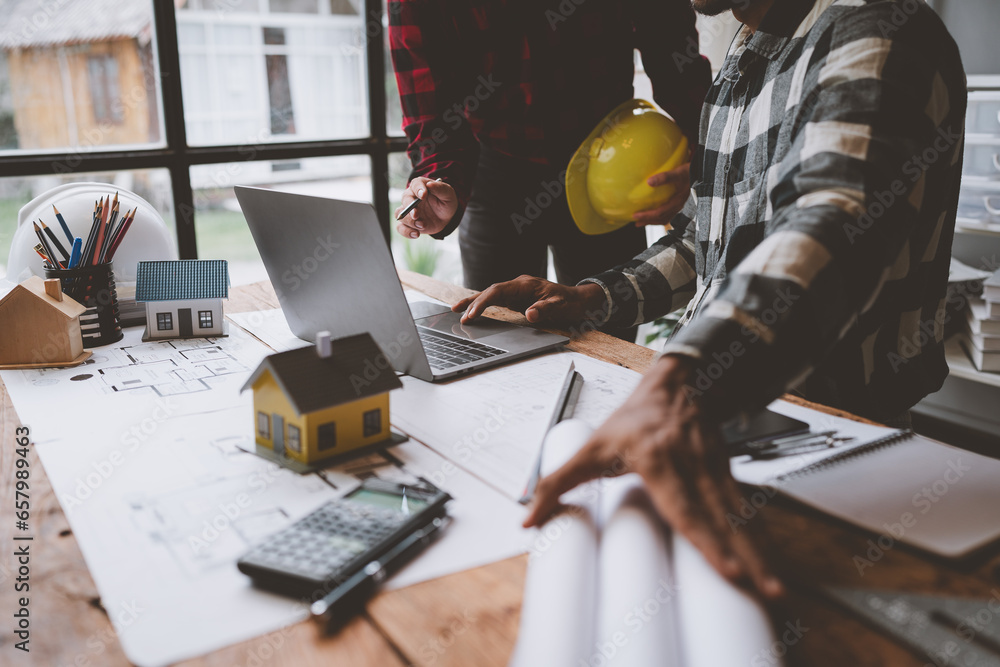 Architects and engineers work together in business, submitting ...