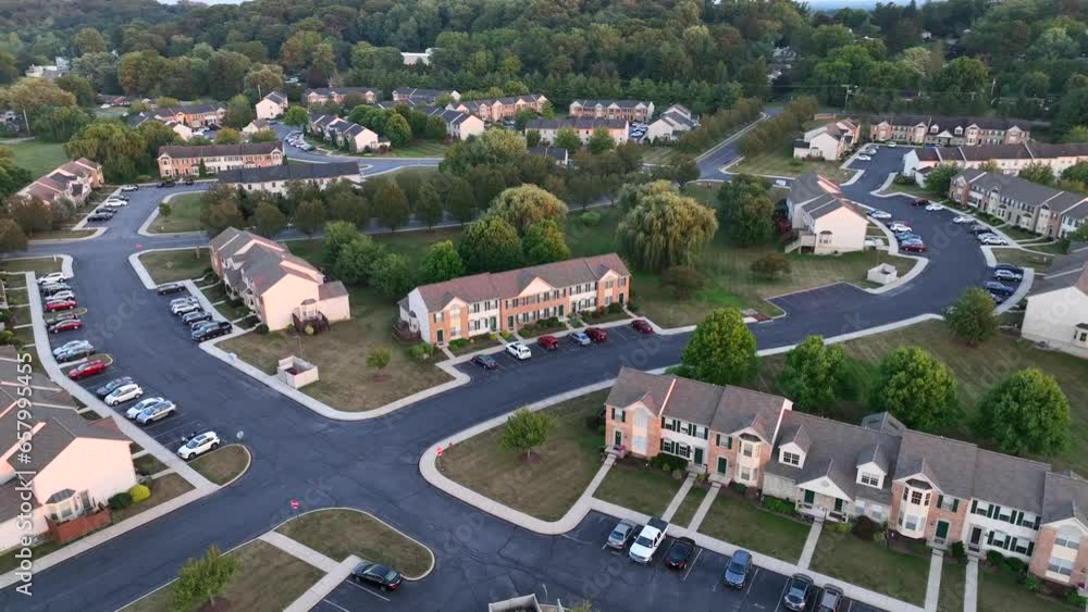 American neighborhood of apartment complexes in suburbs. Aerial reveal ...