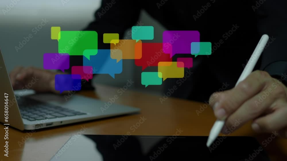 Businessman hand working with laptop typing Live chat chatting and ...