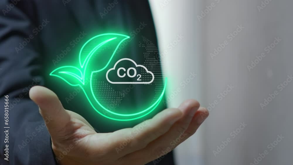 Businessman shows virtual leaf icon with CO2 icon. Net zero greenhouse ...