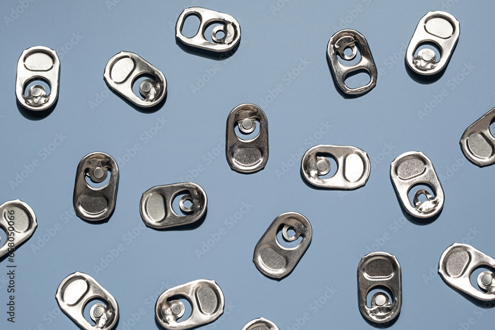 Ring pull tabs for open of drinking can. Stock Photo | Adobe Stock