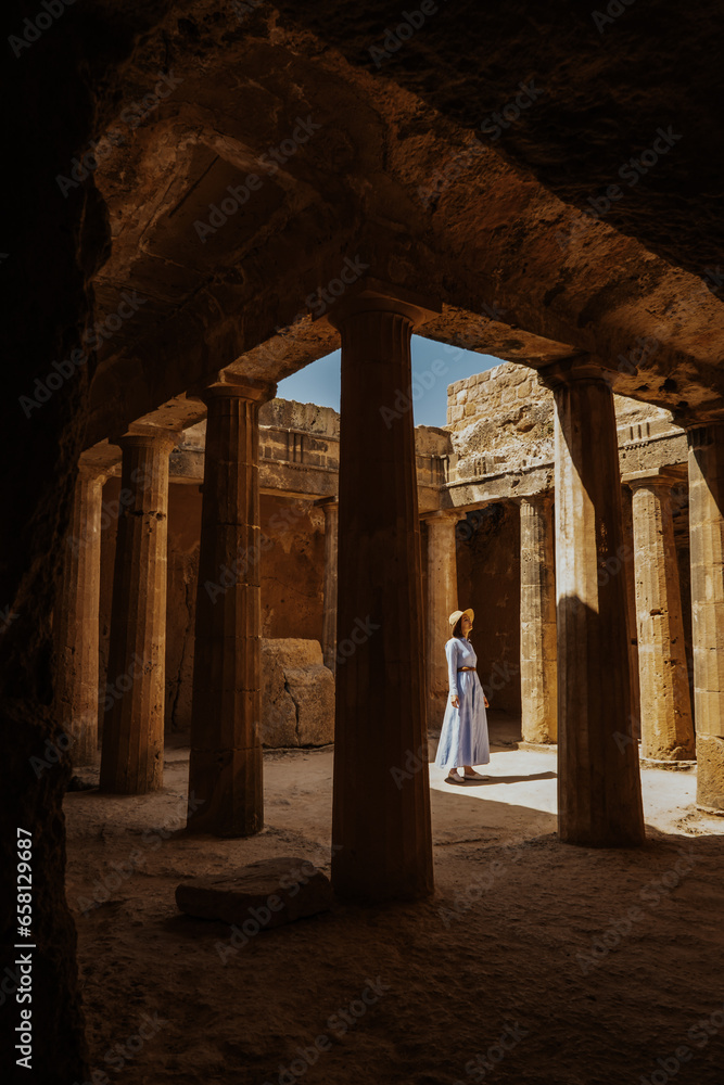 Cyprus. Paphos. Tombs of the Kings. Paphos Royal antique cemetery. Girl ...