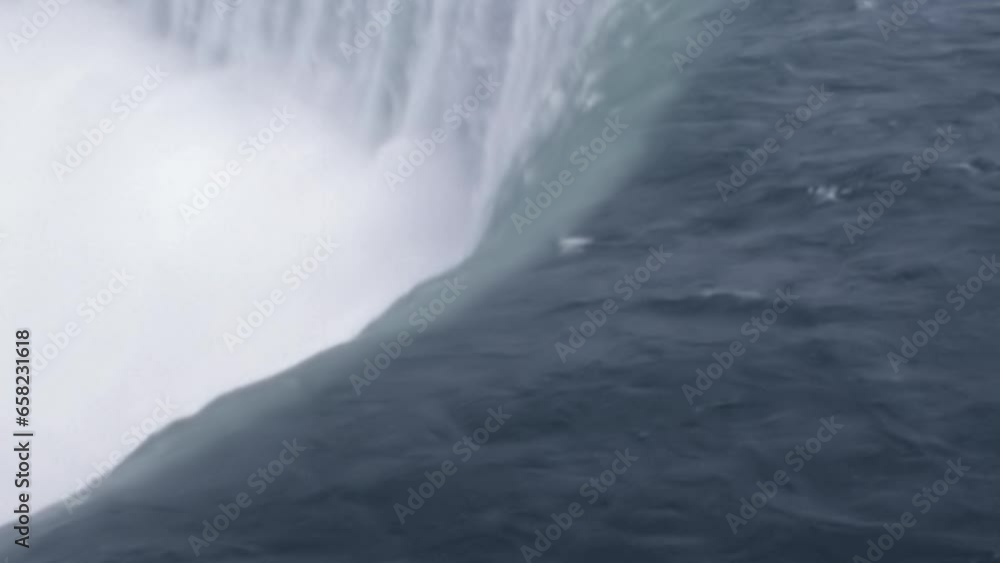 Close-up view of Niagara Falls water falling in archival stock footage ...