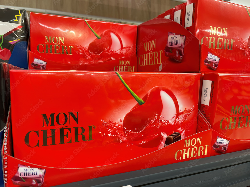 Spot the elegant Mon Chéri praline box displayed on a store shelf Stock ...