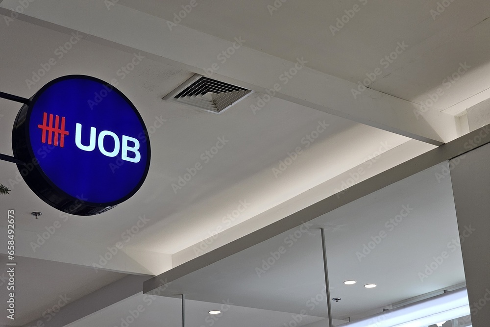 BANGKOK, THAILAND - SEPTEMBER 23, 2023: UOB Sign. UOB is a Singaporean multinational banking ...