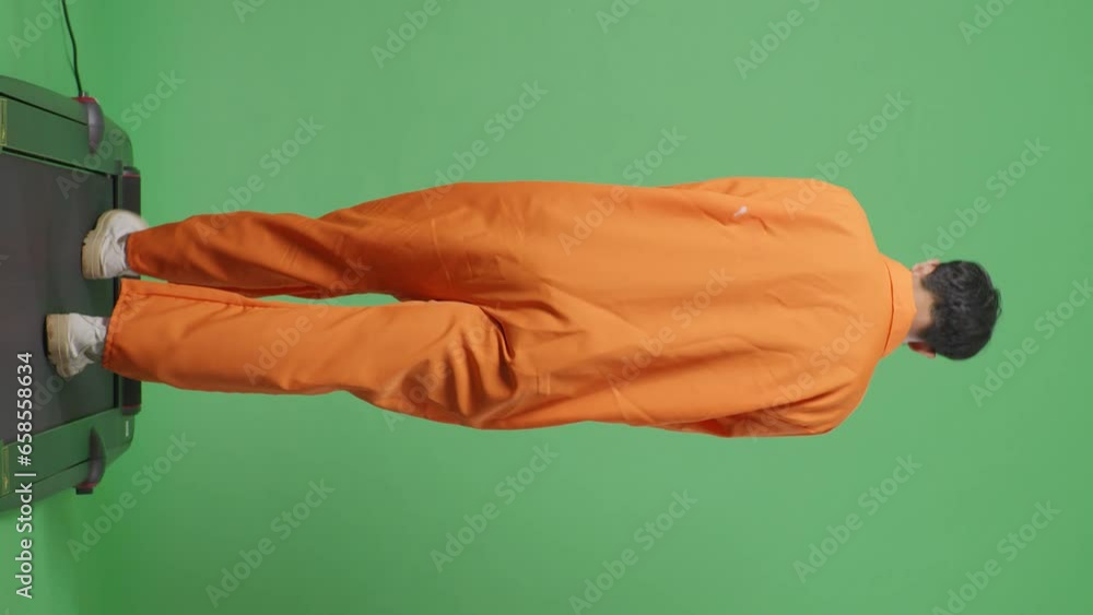 Back View Full Body Of Asian Male Prisoner In Handcuffs Walking On The ...