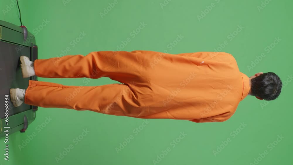 Back View Full Body Of Asian Male Prisoner In Handcuffs Walking On The ...