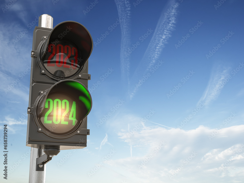 Traffic light with green light 2024 and red 2023 on sky background ...