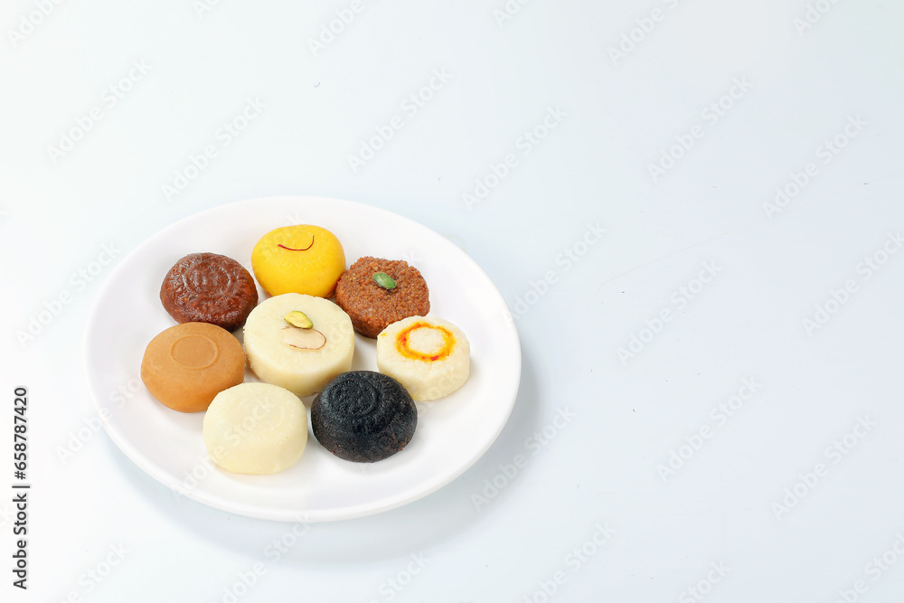milk peda with 8 type flavour isolated white dish breground,Indian ...