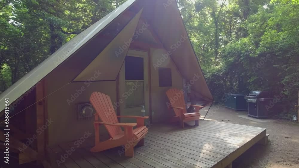 Point Pelee camping site with cabin tent under canopy of the Carolinian ...