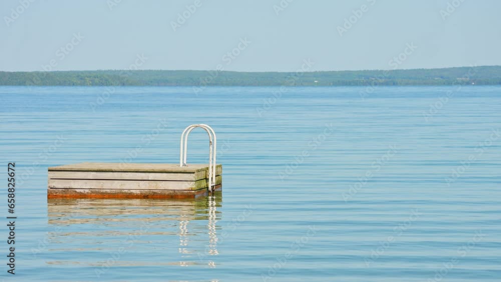 Swim platform or swimming raft slow motion, located at Lake Manitou ...