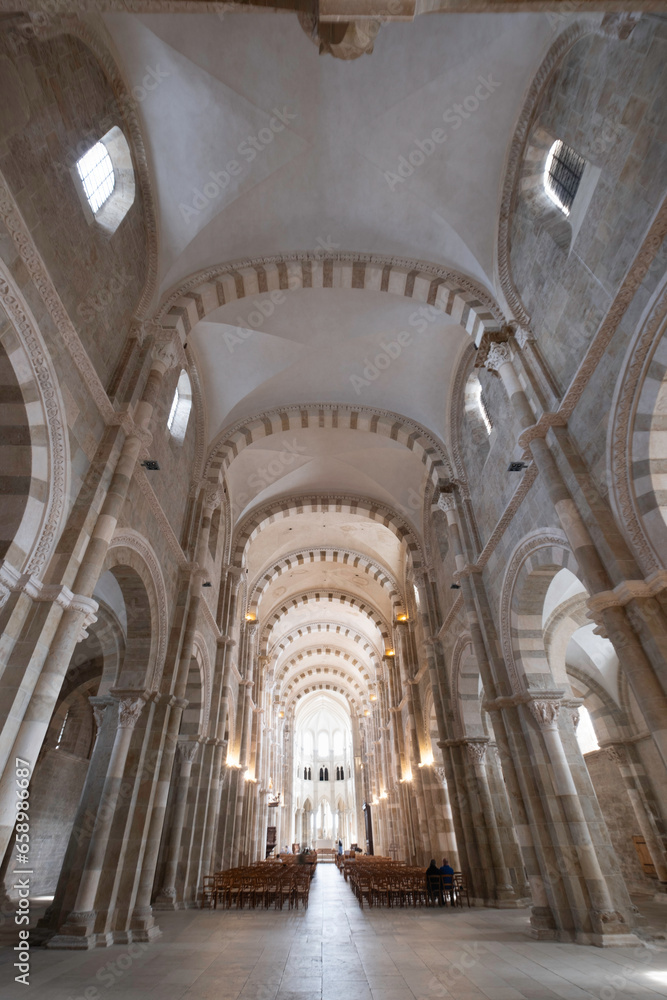 Interior with nave and Romanesque vault of the Benedictine and Cluniac ...