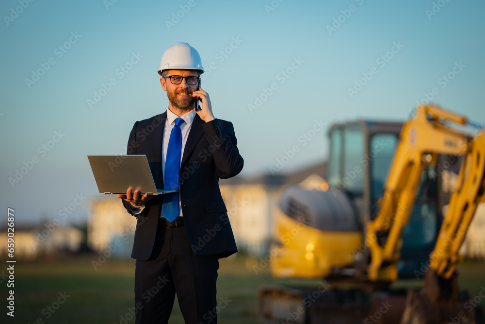 Civil engineer worker at a construction site. Mature engineer worker ...