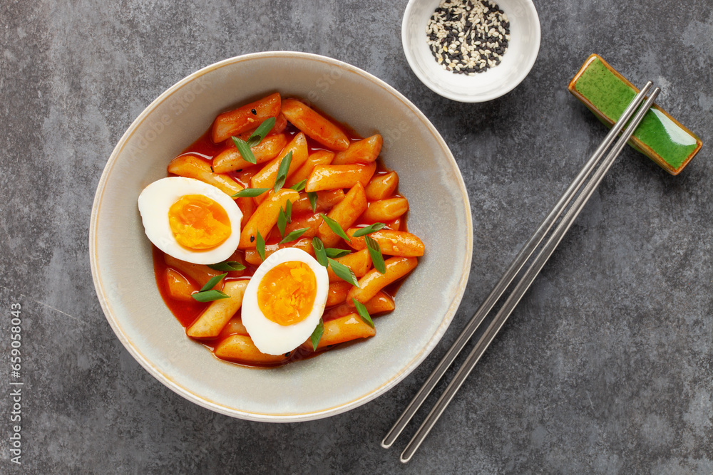 Tteokbokki with eggs in gray bowl . Tteok-bokki is a korean cuisine ...