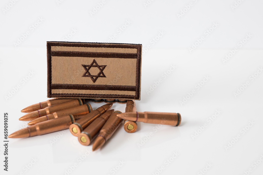 Israel flag with rifle ammunition. War between Israel and Lebanon. 7 ...