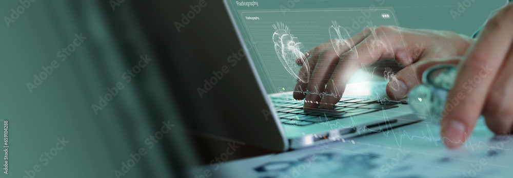 Cardiologist doctor using laptop computer examine patient heart ...