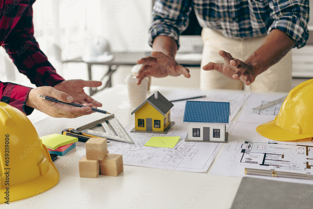 Architect, design engineer working on blueprint planning Group of ...