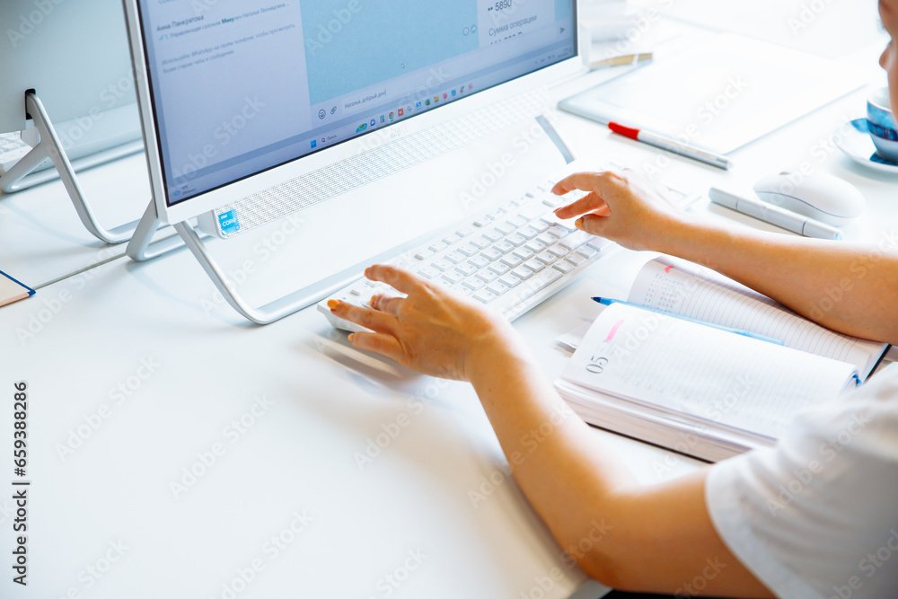 female hands typing on keyboard, woman writing letter, iMac. desktop ...